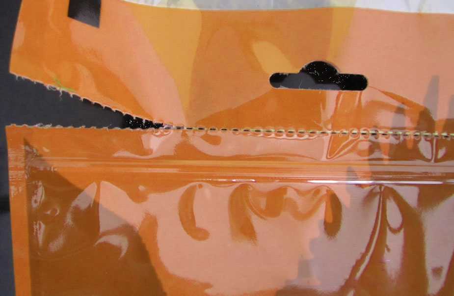 Simplifying resealable easy-open packaging production